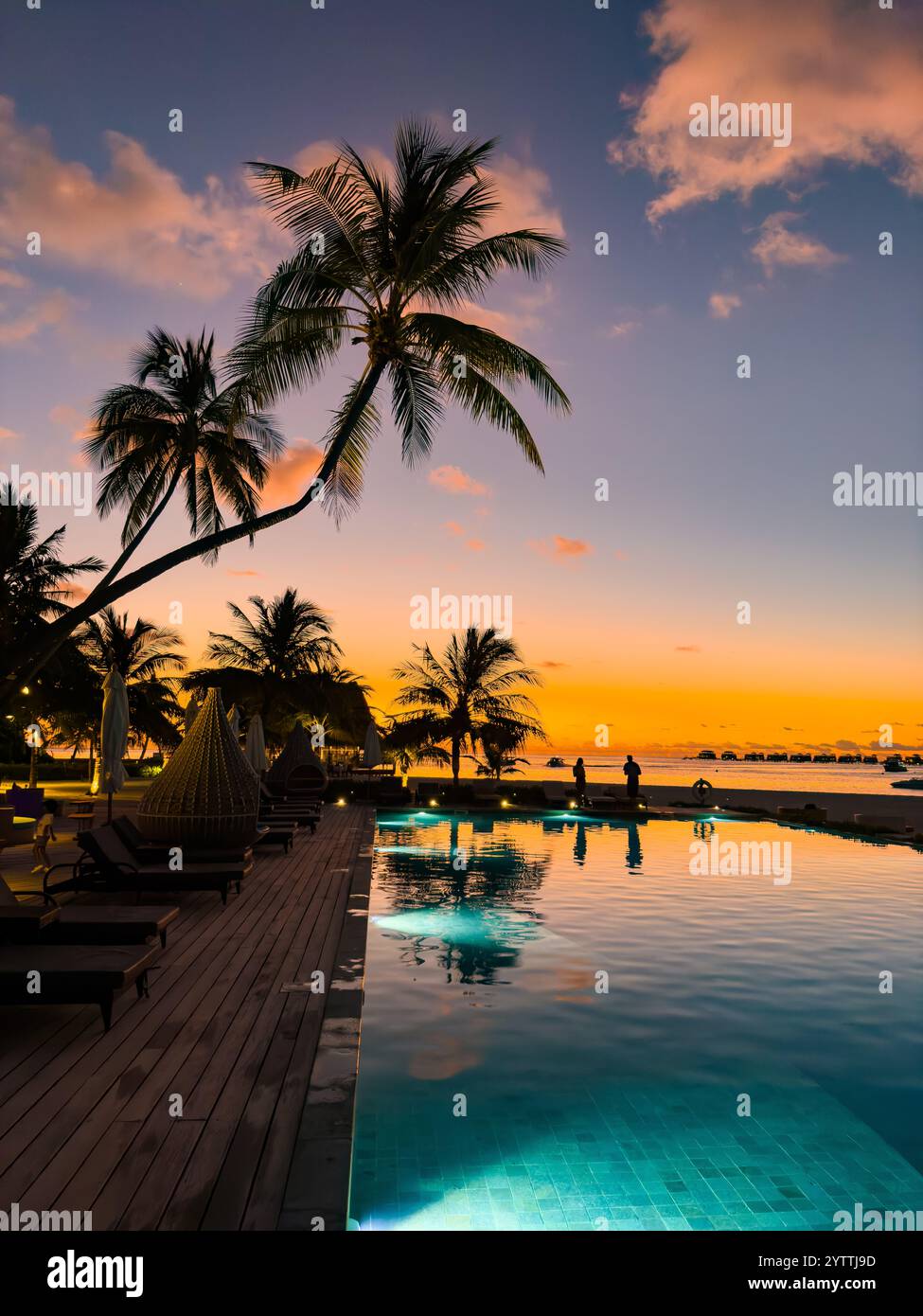 Sunset at beach resort in the Maldives, Asia Stock Photo - Alamy