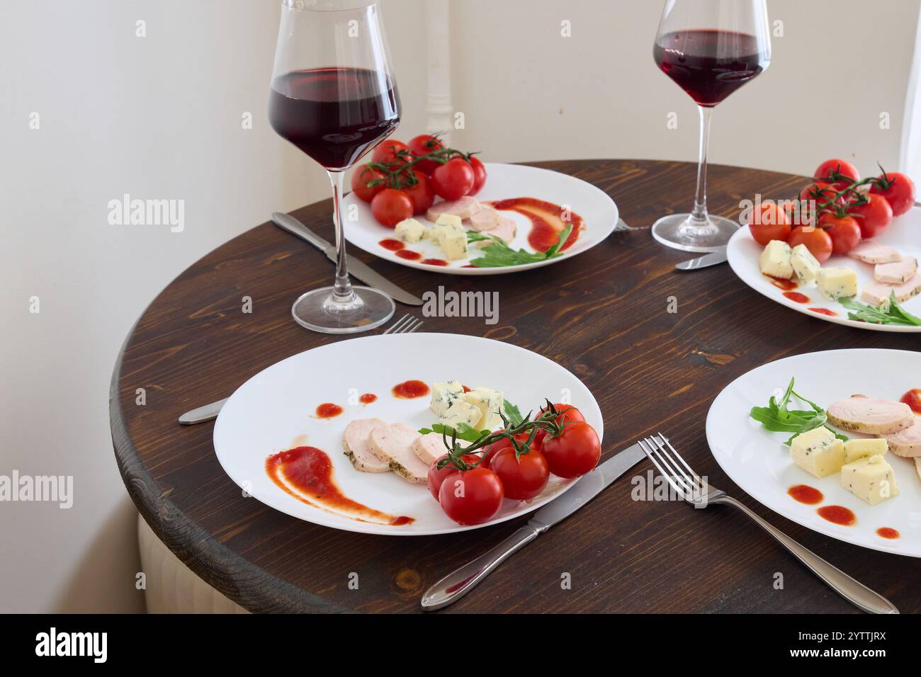 An Elegant and Tasteful Dining Setup Complete with Wine and Fresh ...