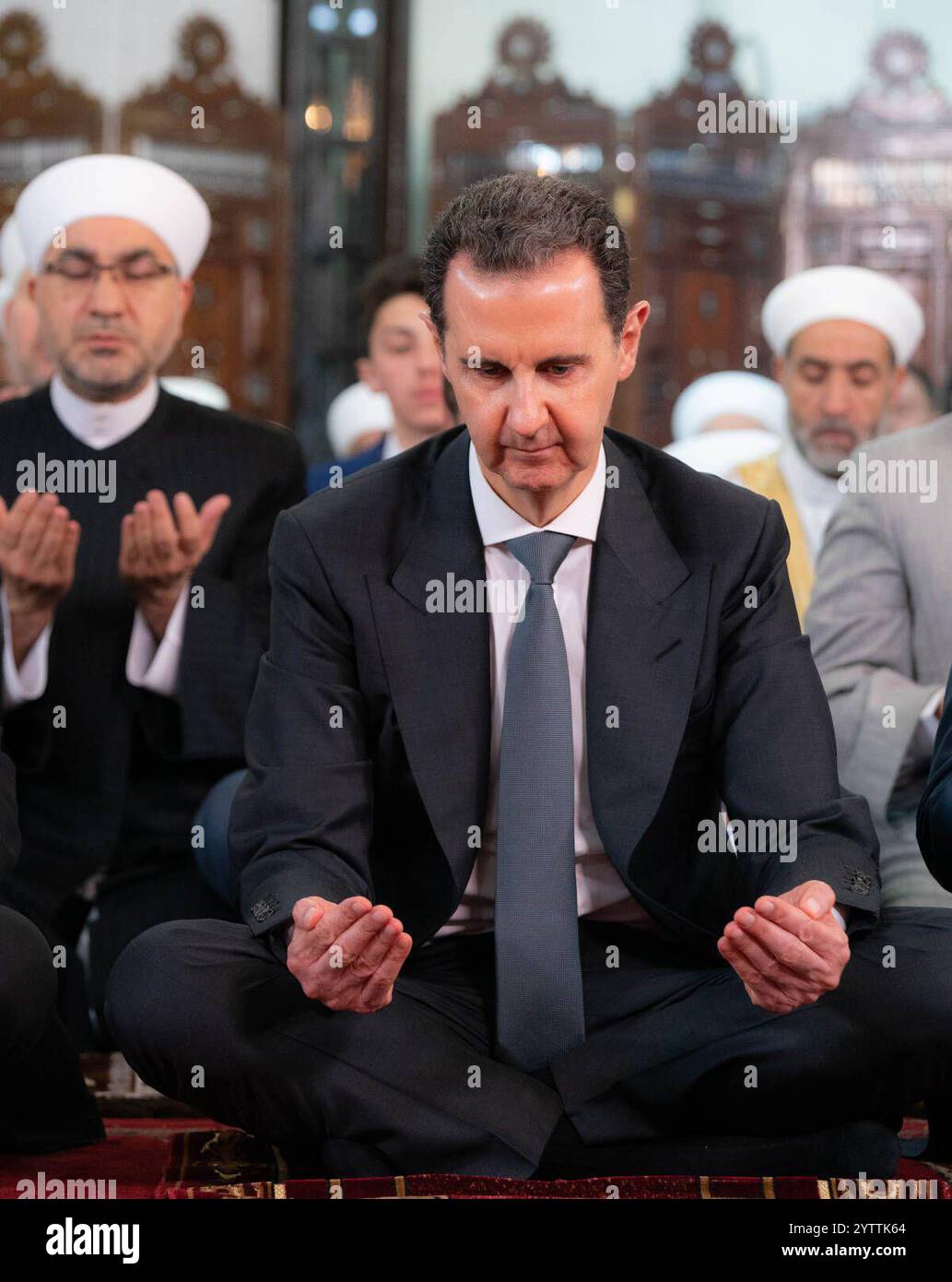 Syrian President Bashar al-Assad attends the prayer of Eid al-Adha or feast of the sacrifice at ...