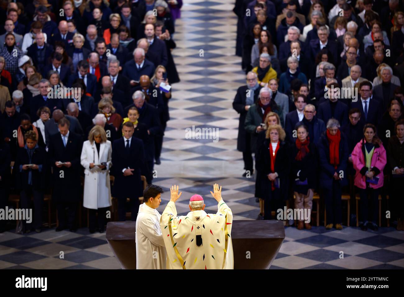 Archbishop Laurent Ulrich blesses the altar during an inaugural Mass ...