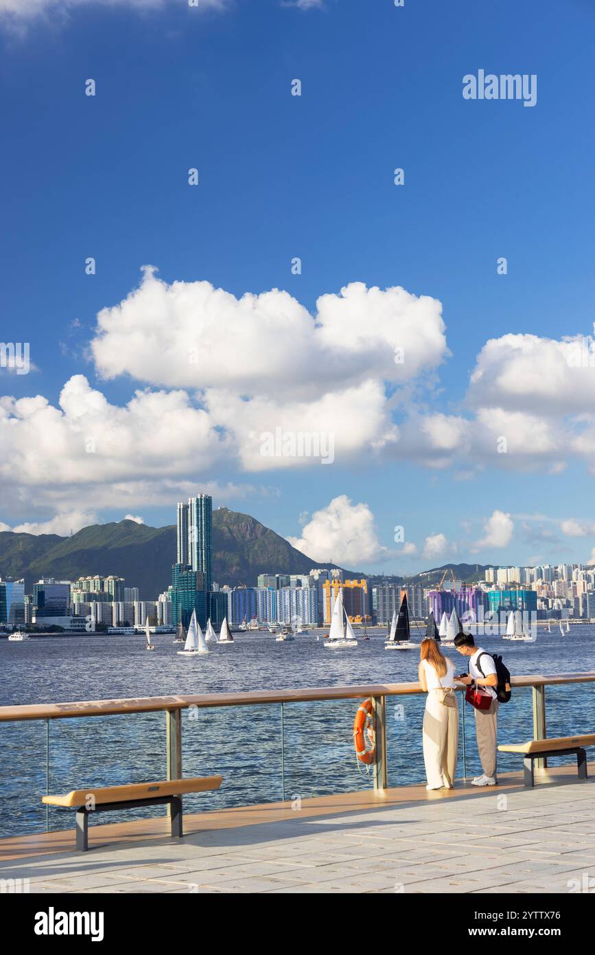 Couple at Wan Chai waterfront, Wan Chai, Hong Kong Island, Hong Kong ...