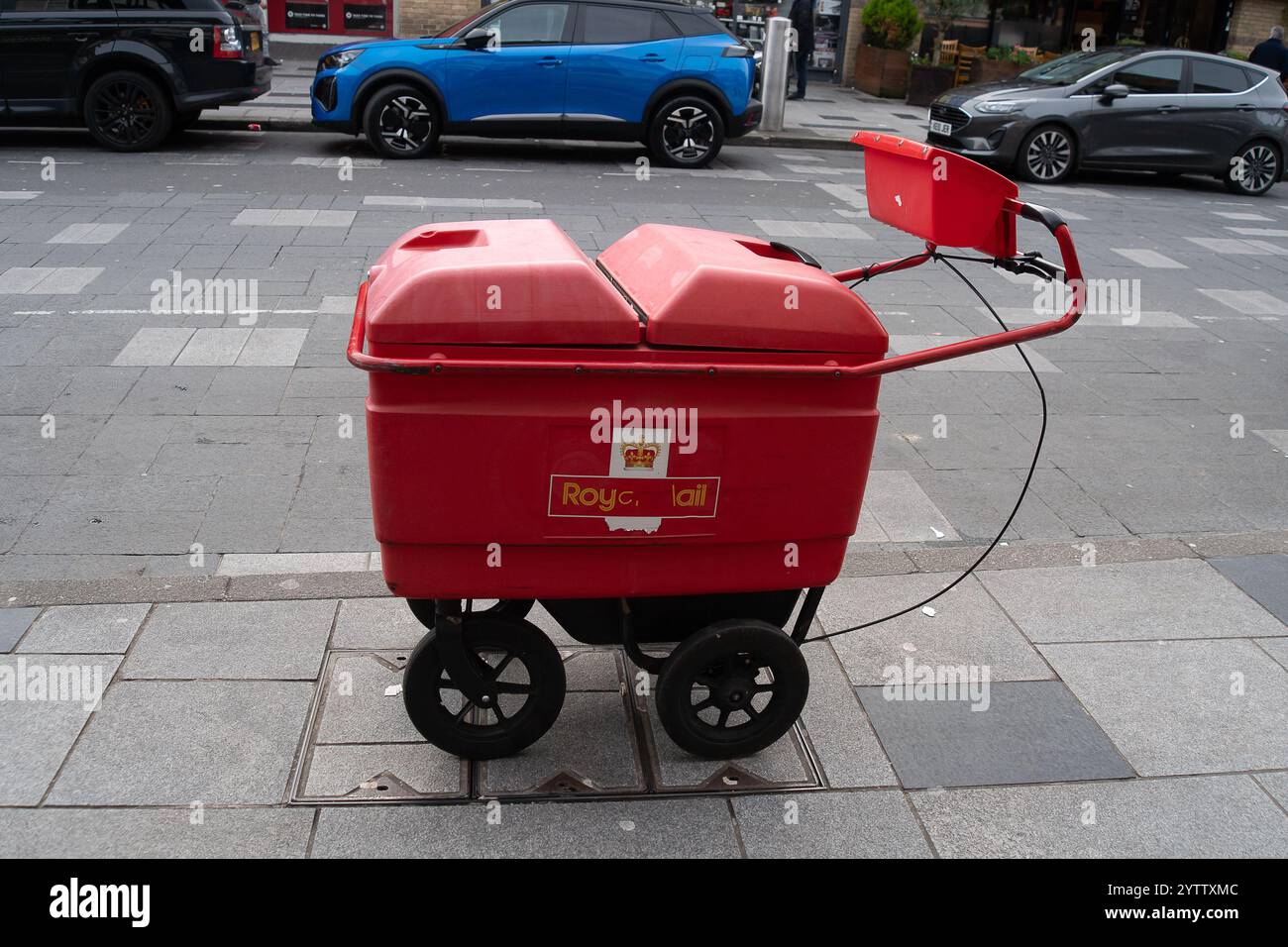 Slough, UK. 6th December, 2024. A Royal Mail cart in Slough, Berkshire ...