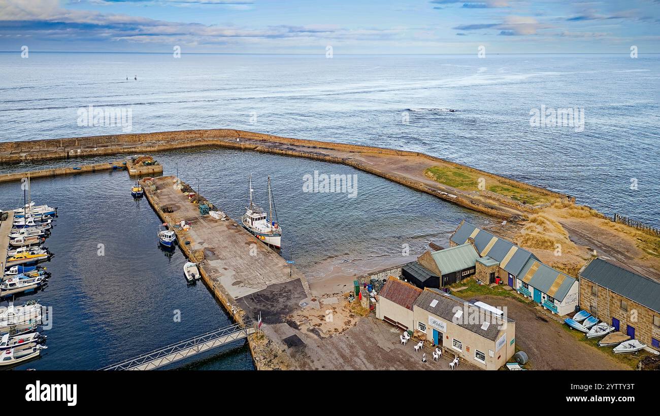 Hopeman Moray Coast Scotland the harbour houses cafe sea walls moored ...