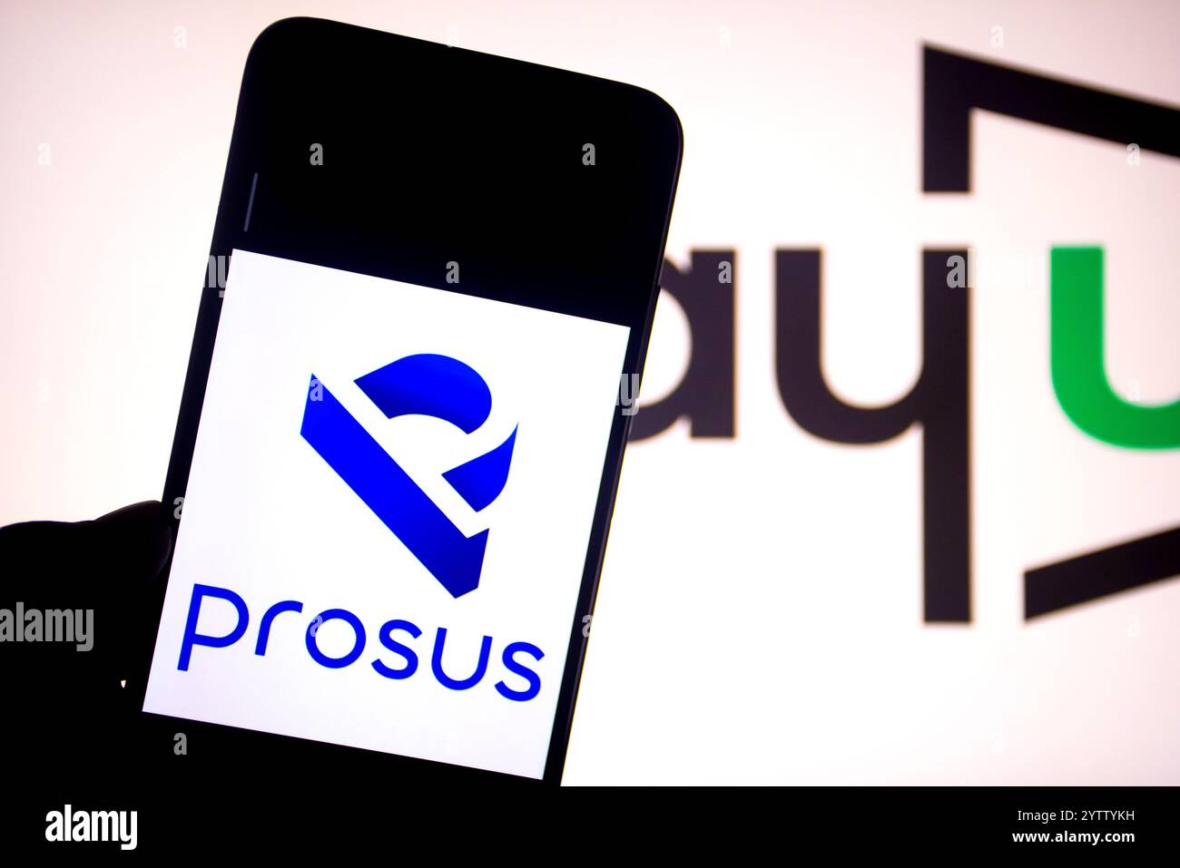 India. 06th Dec, 2024. In this photo illustration, a Prosus logo is seen displayed on a ...