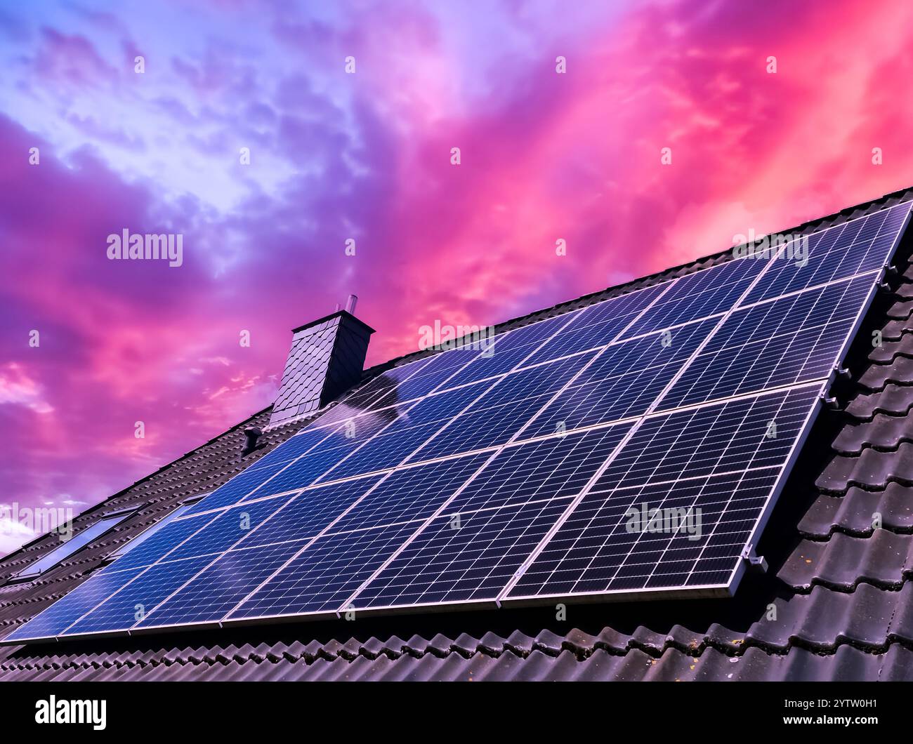 Solar panels producing clean energy on a roof of a residential house ...