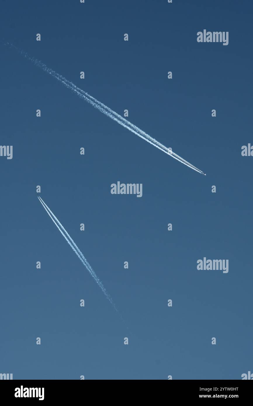 Airplane with vapor trail hi-res stock photography and images - Alamy