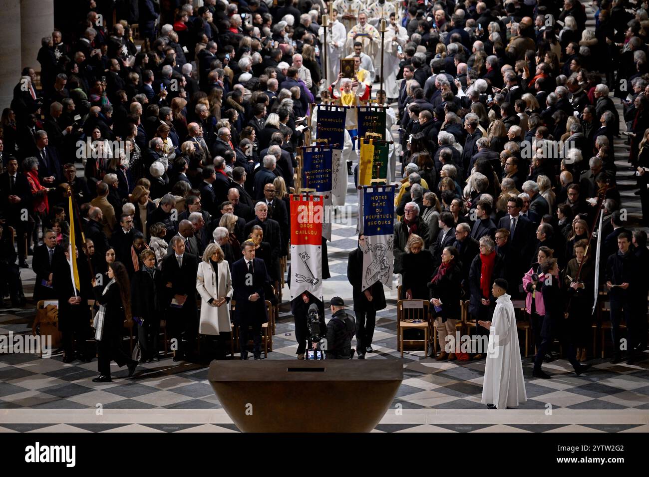 Front row from right, French President Emmanuel Macron, his wife ...