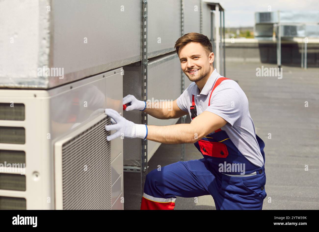 Portrait Of Engineer Inspecting Hvac System On Roof Stock Photo - Alamy