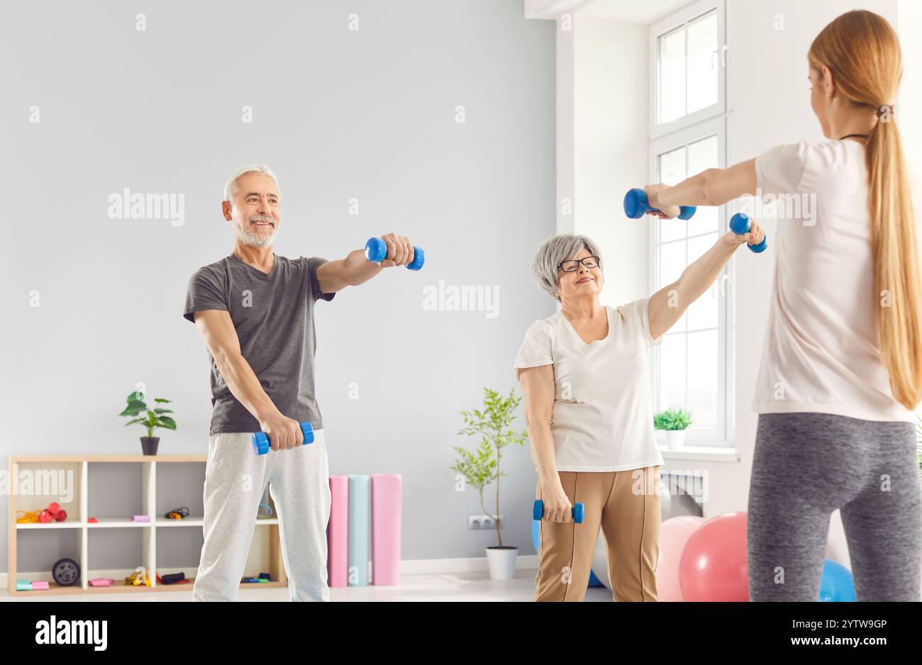Senior patient doing muscle exercise hi-res stock photography and ...