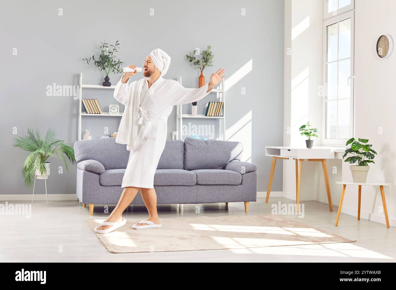 Energetic young man singing dancing hi-res stock photography and images ...