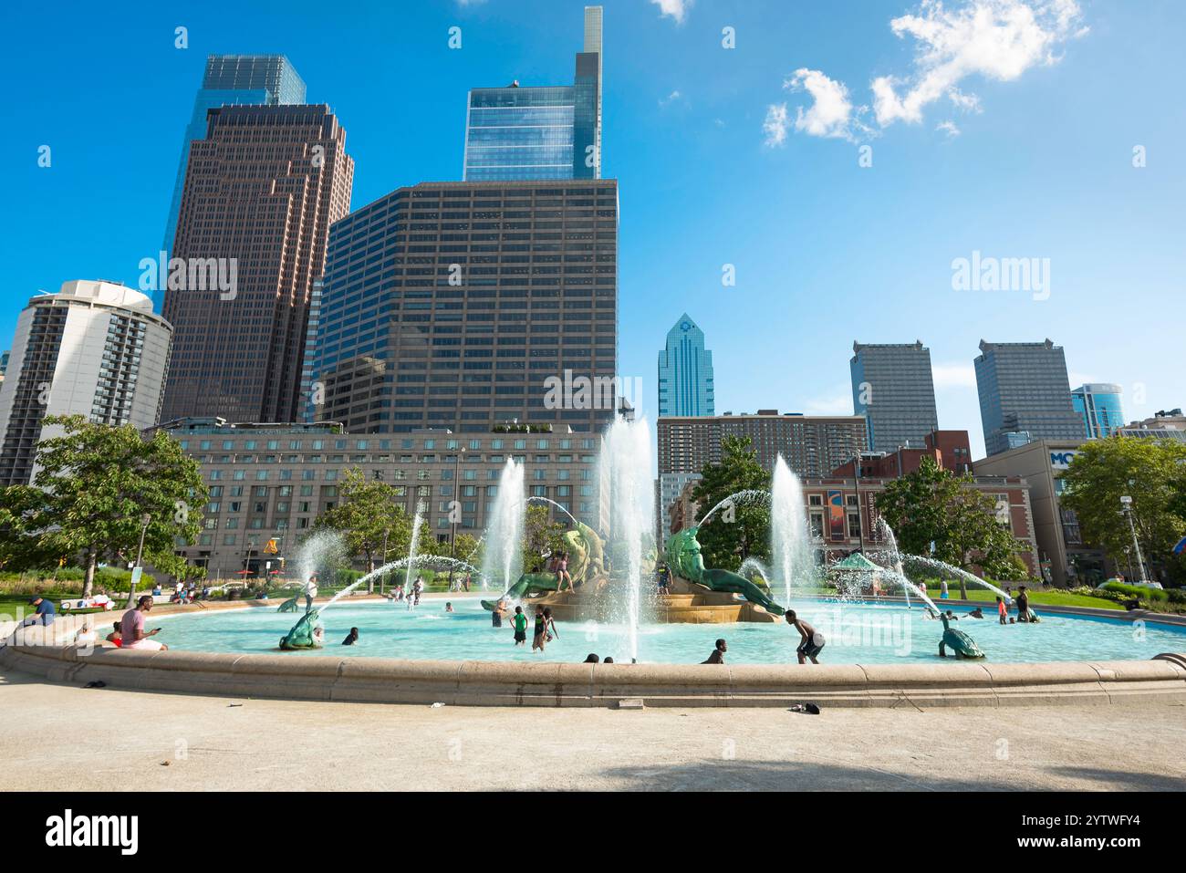 Logan Square fountain, view of young people playing in the Logan Square ...