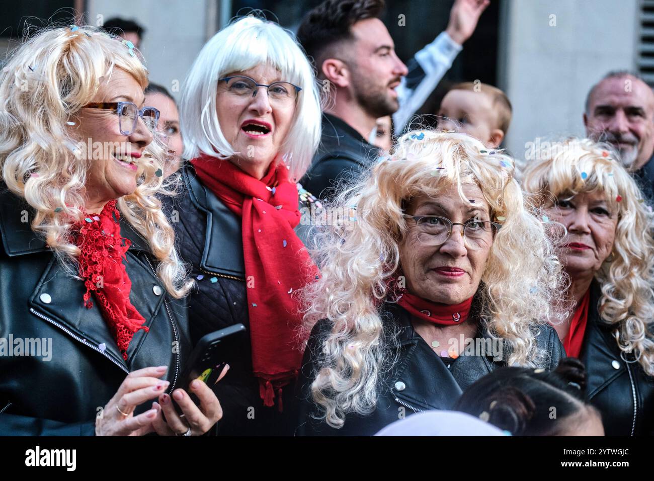The image shows a group of individuals who appear to be having a good ...