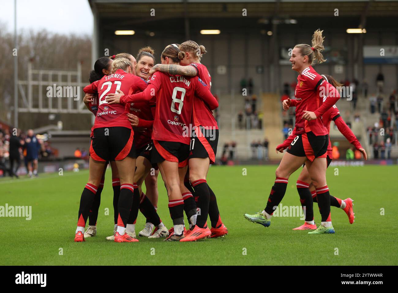 Dominique Janssen of Manchester United celebrates her goal to make it 3 ...