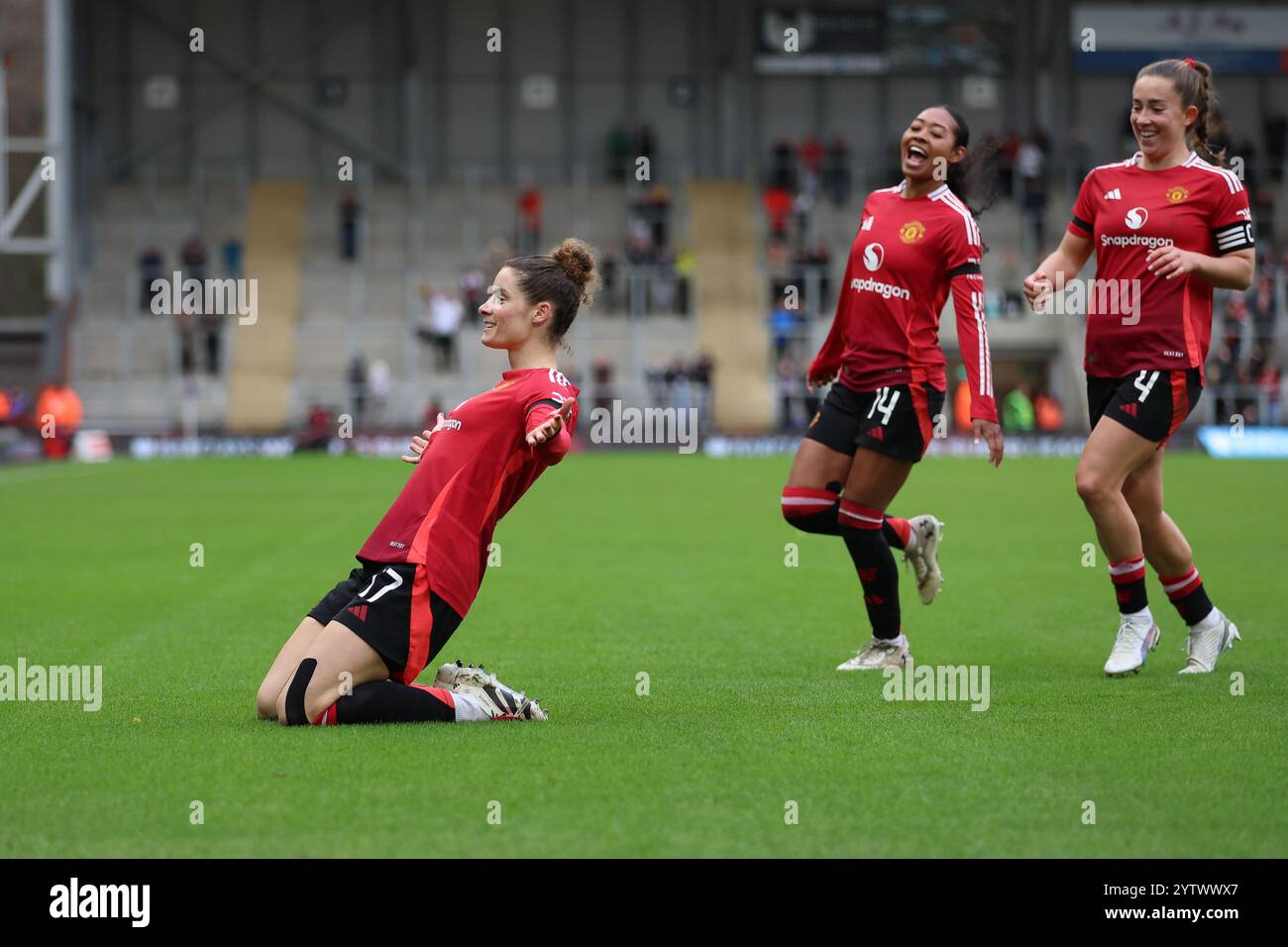 Dominique Janssen of Manchester United celebrates her goal to make it 3 ...