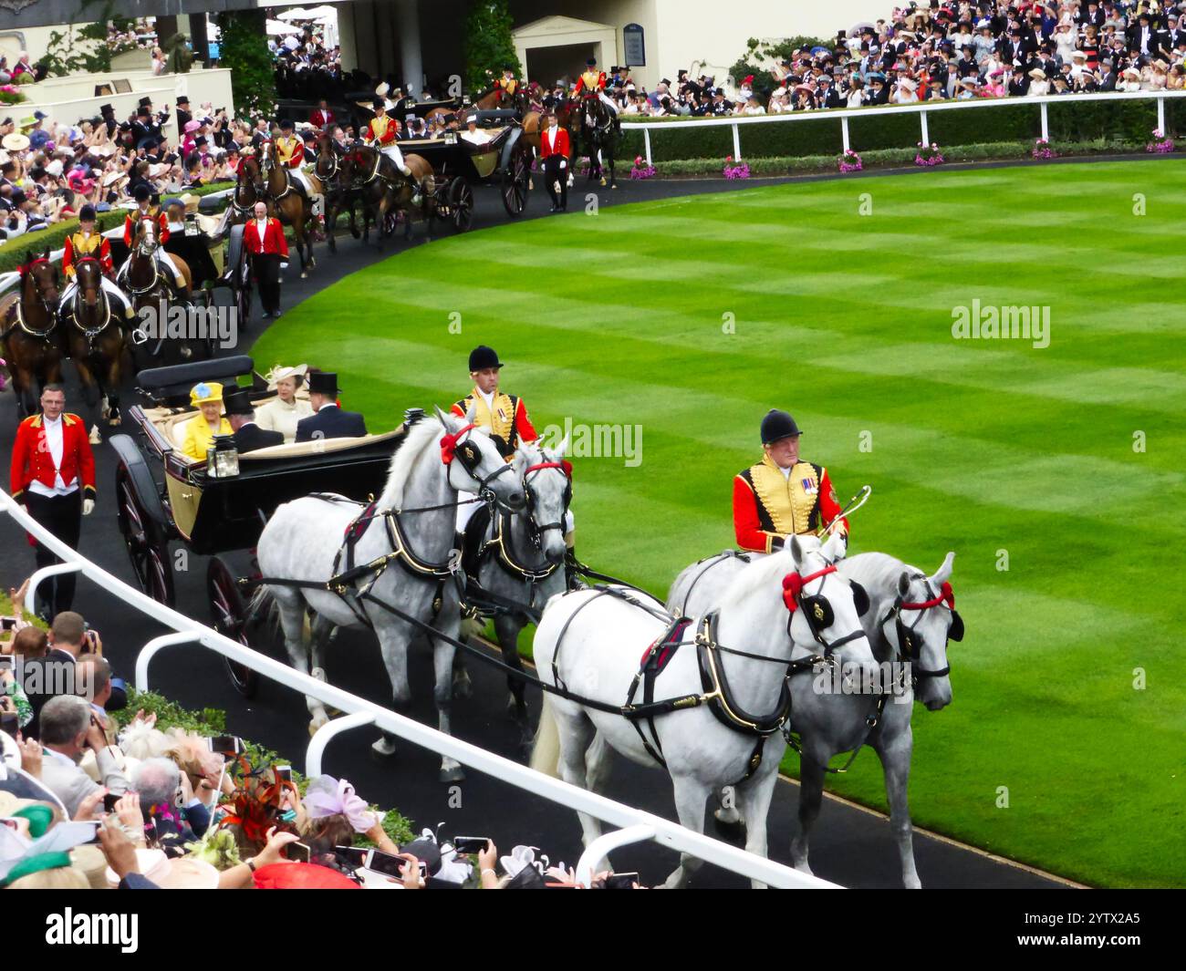 Elizabeth ii and the princess royal wearing yellow. Riding in the Royal ...