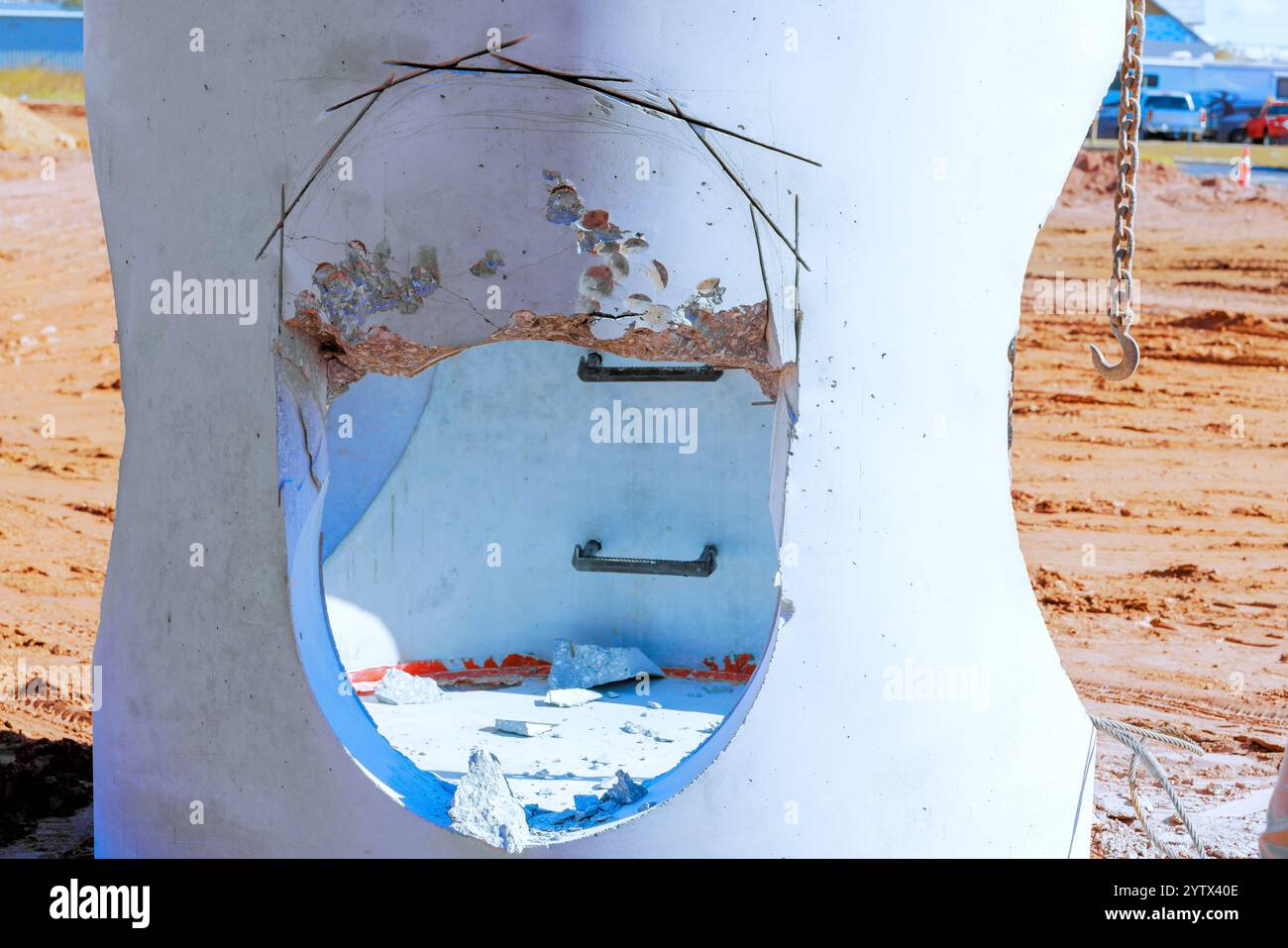 Construction site shows damaged concrete structure with an opening ...