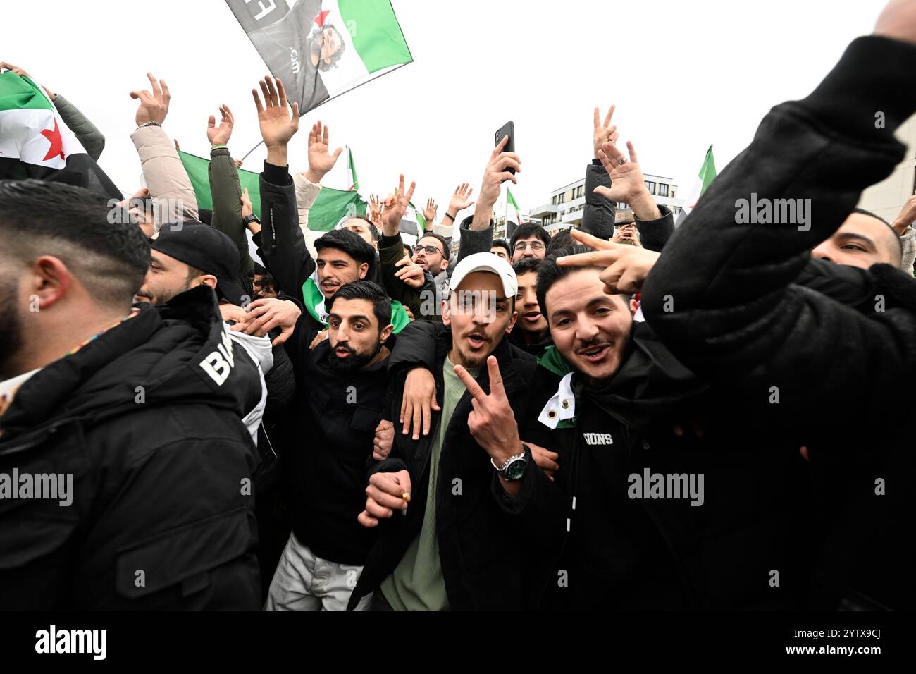 Essen, Germany. 08th Dec, 2024. Syrians in the city celebrate the ...
