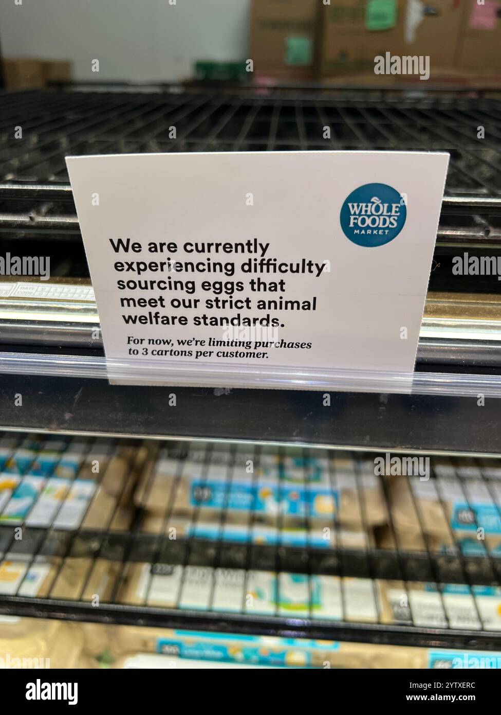 Shelf signage at Whole Foods indicating a shortage in supply of eggs ...