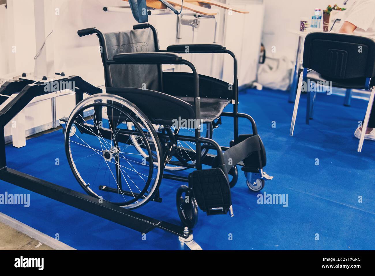 Reinforced wheelchair with brake keys for assistant Stock Photo - Alamy