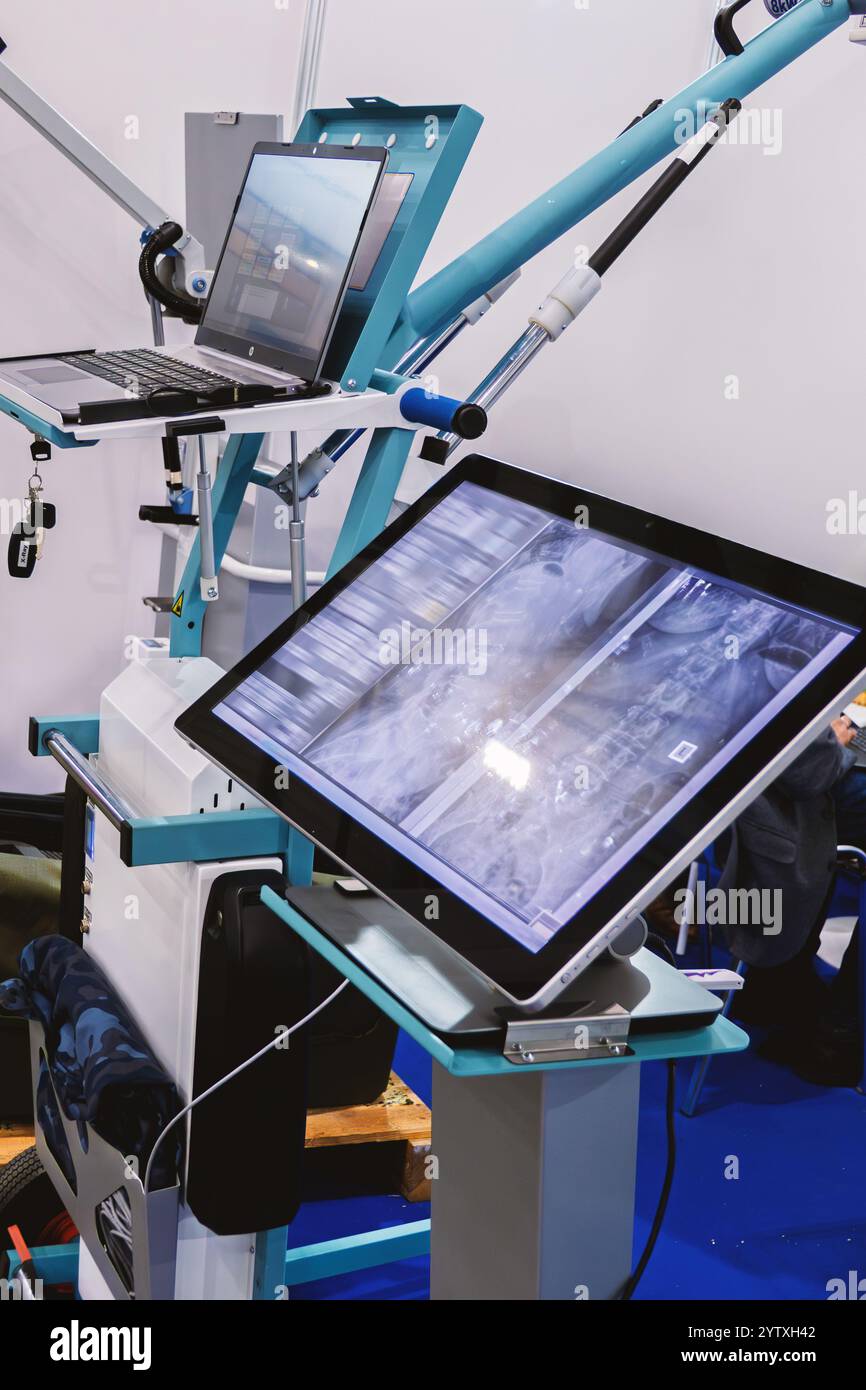 Modern portable X-ray machine with images displayed on a monitor Stock ...