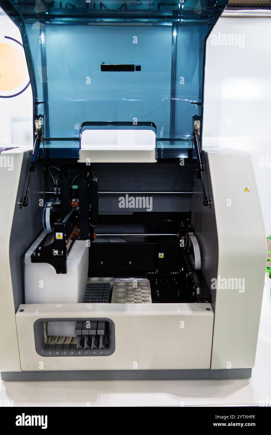 Automatic coagulometer analyzer for monitoring hemostasis Stock Photo ...