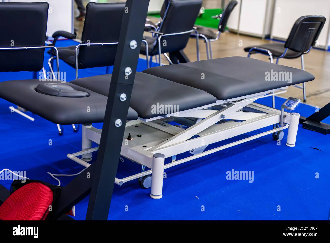 Three-section massage table with adjustable height Stock Photo - Alamy