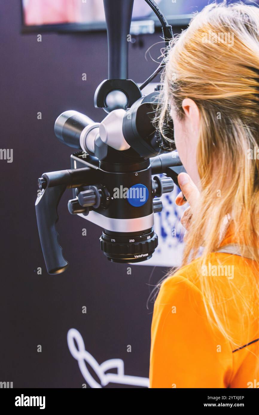 Dental treatment microscope woman hi-res stock photography and images ...