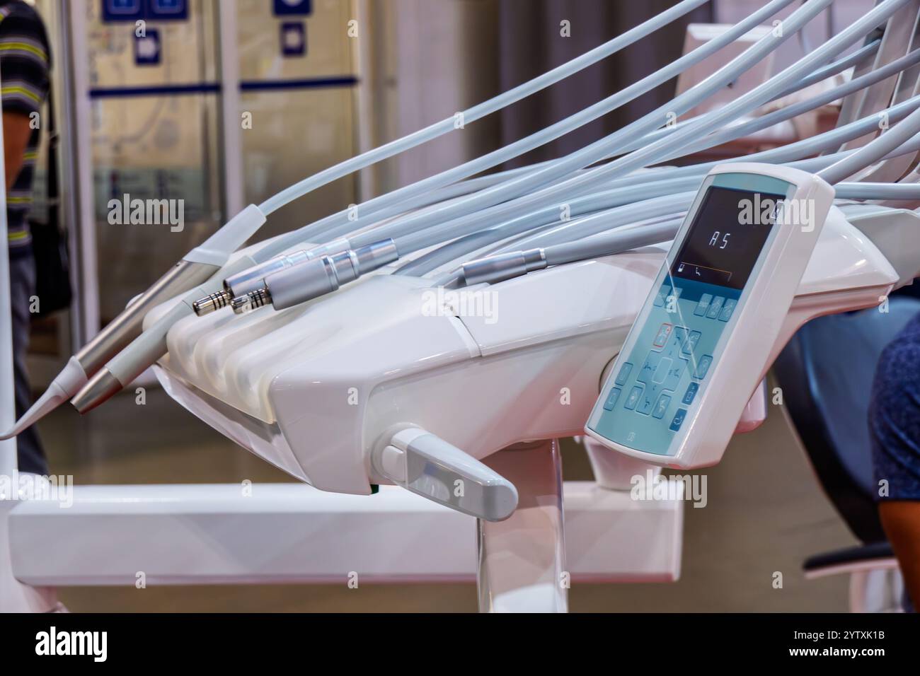 Dental unit with instrument holder with working position fixation and ...