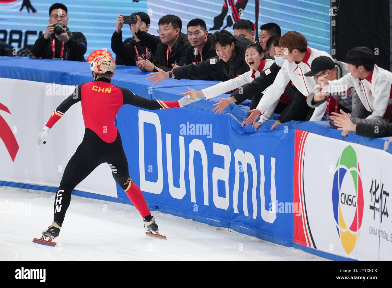 Beijing, China. 8th Dec, 2024. Liu Shaoang (L) of China celebrates ...
