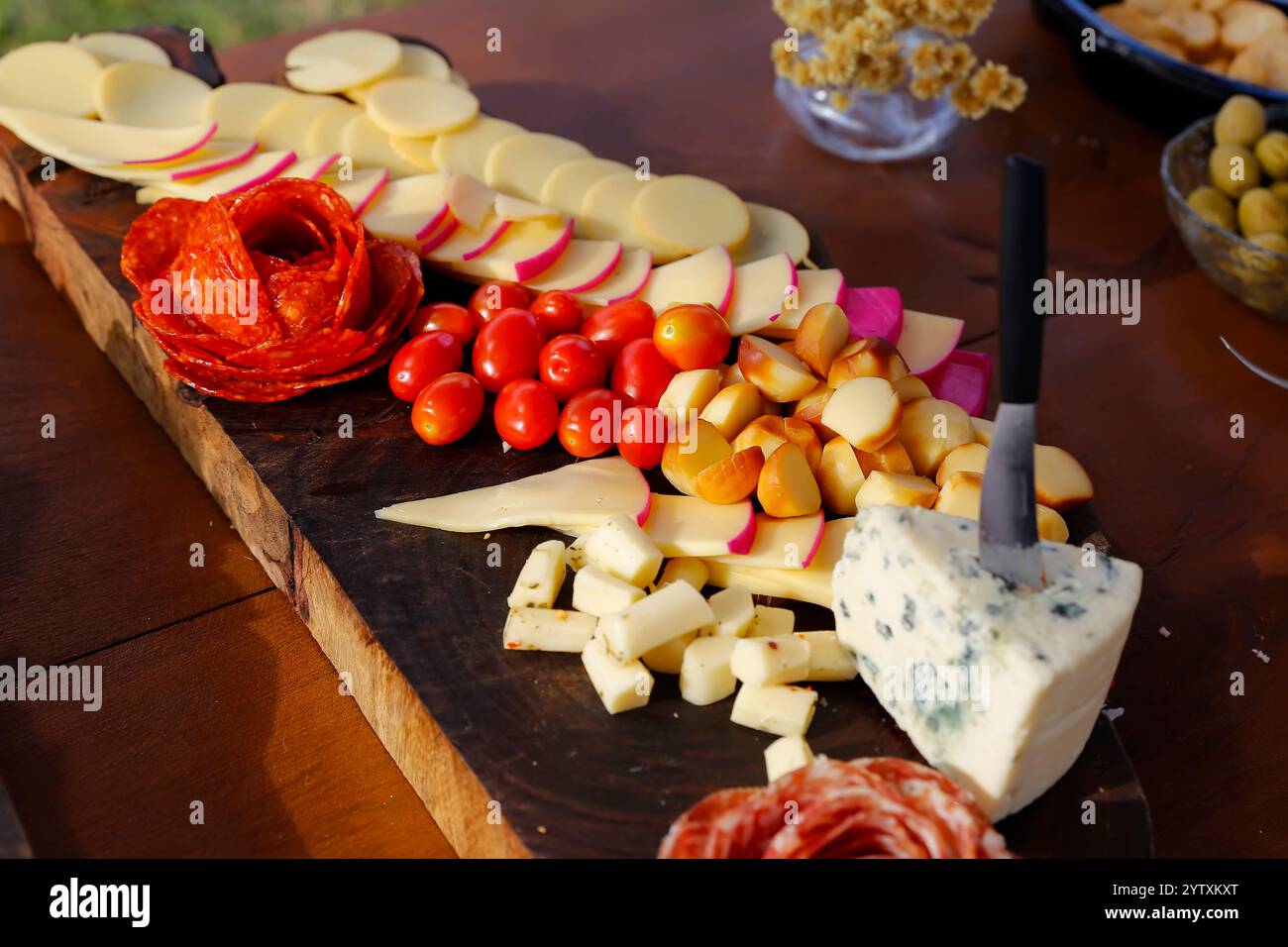 Assorted cheeses on wooden hi-res stock photography and images - Alamy