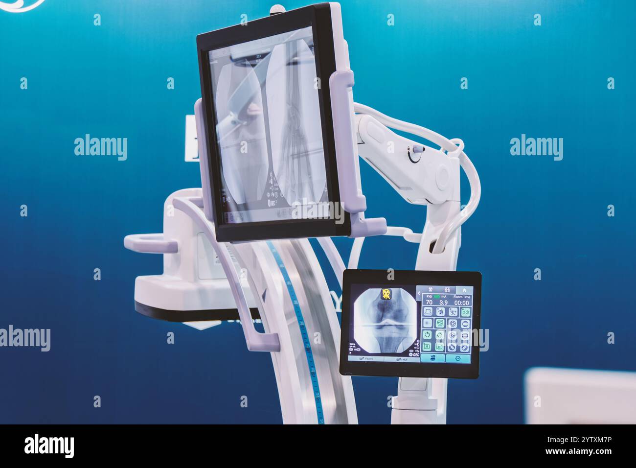 X-ray equipment C-arm with flat panel detector and monitor Stock Photo ...