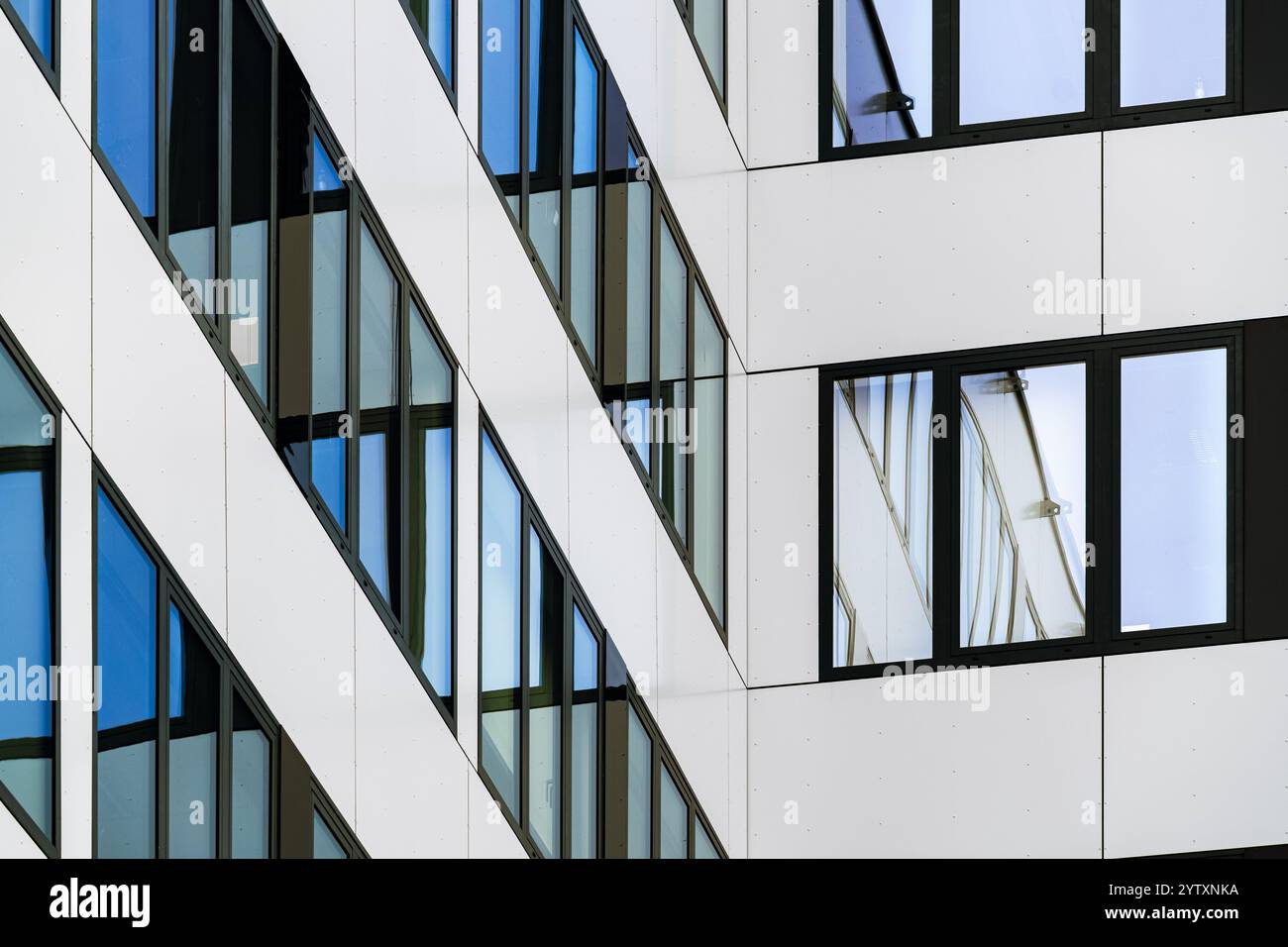 Modern Office Building Facade with Geometric Glass Windows and Contemporary Architectural Design ...