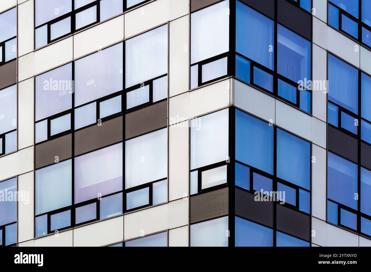 Modern Office Building Facade with Geometric Glass Windows and ...