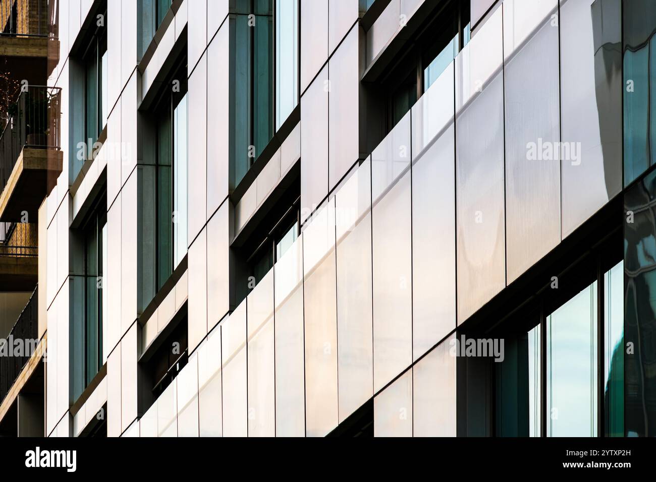 Modern Glass Building Facade with Reflective Panels and Minimalist ...