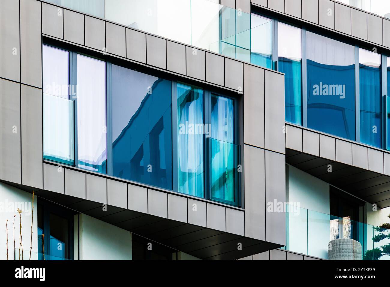 Modern Apartment Building with Large Glass Windows and Minimalist ...