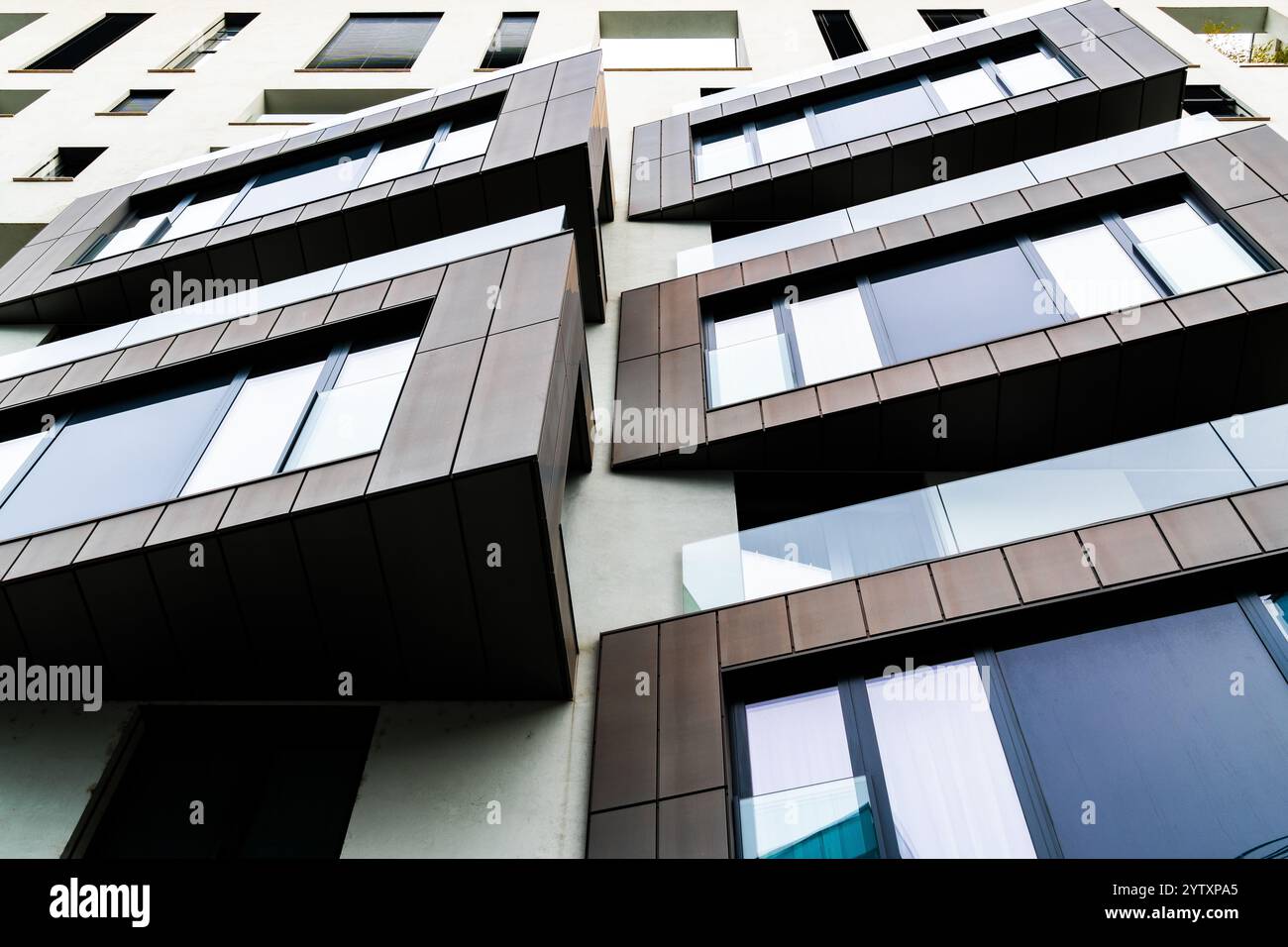 Modern Apartment Building with Large Glass Windows and Minimalist ...