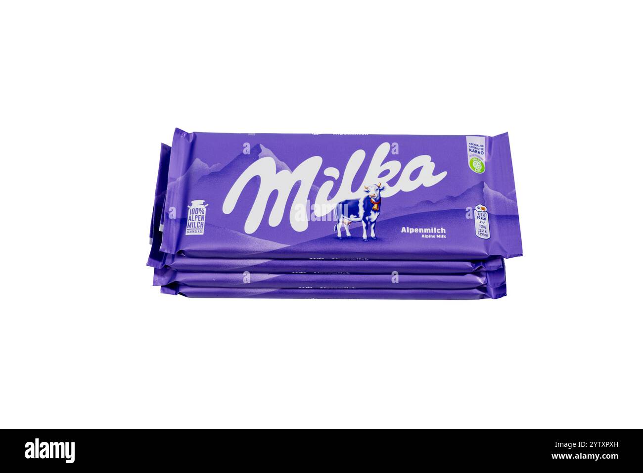 Germany Berlin December 7, 2024. Four milk chocolate bars stacked on ...