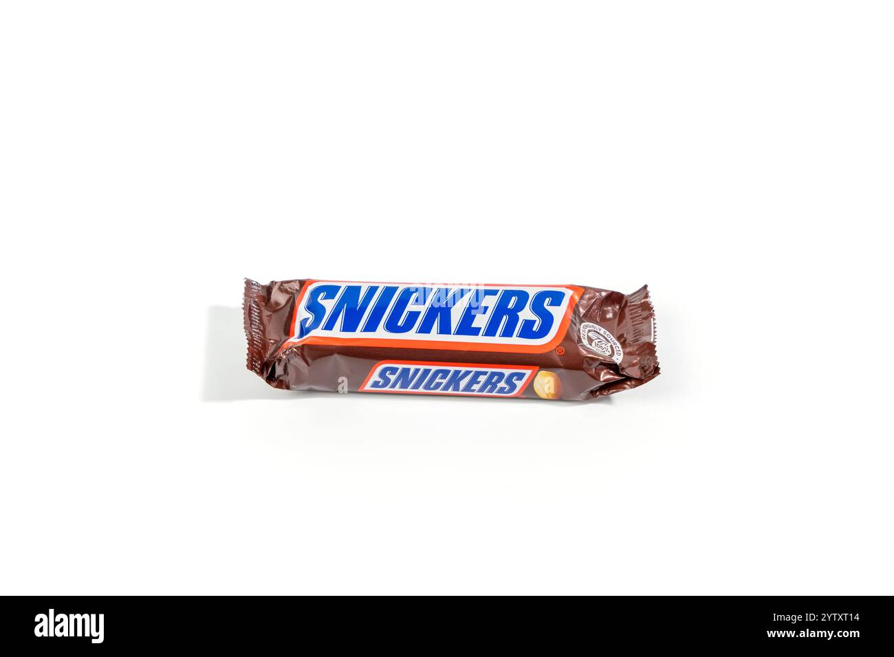 Germany Berlin December 7, 2024. A Snickers bar is sitting on a white ...