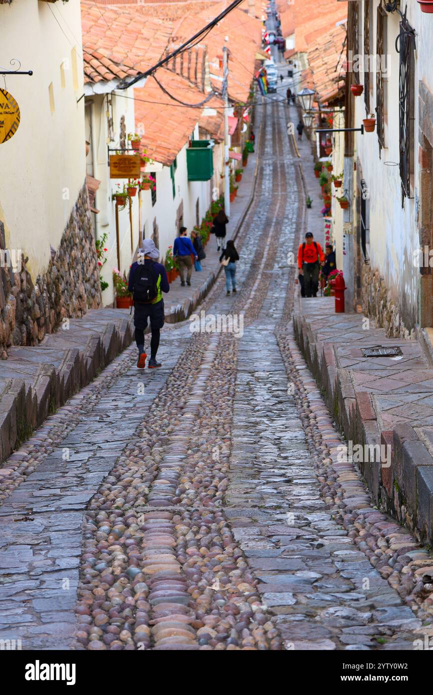 Picturesque long, narrow street in Cusco, Peru Stock Photo - Alamy