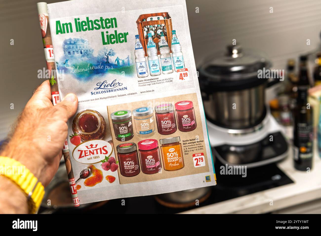 Frankfurt, Germany - Aug 20, 2024: Hand holding a supermarket leaflet ...