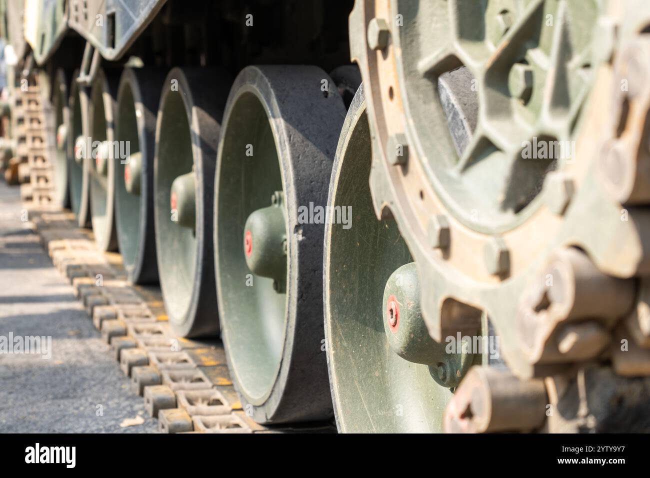 Modern tank green painted tracks close-up Stock Photo - Alamy