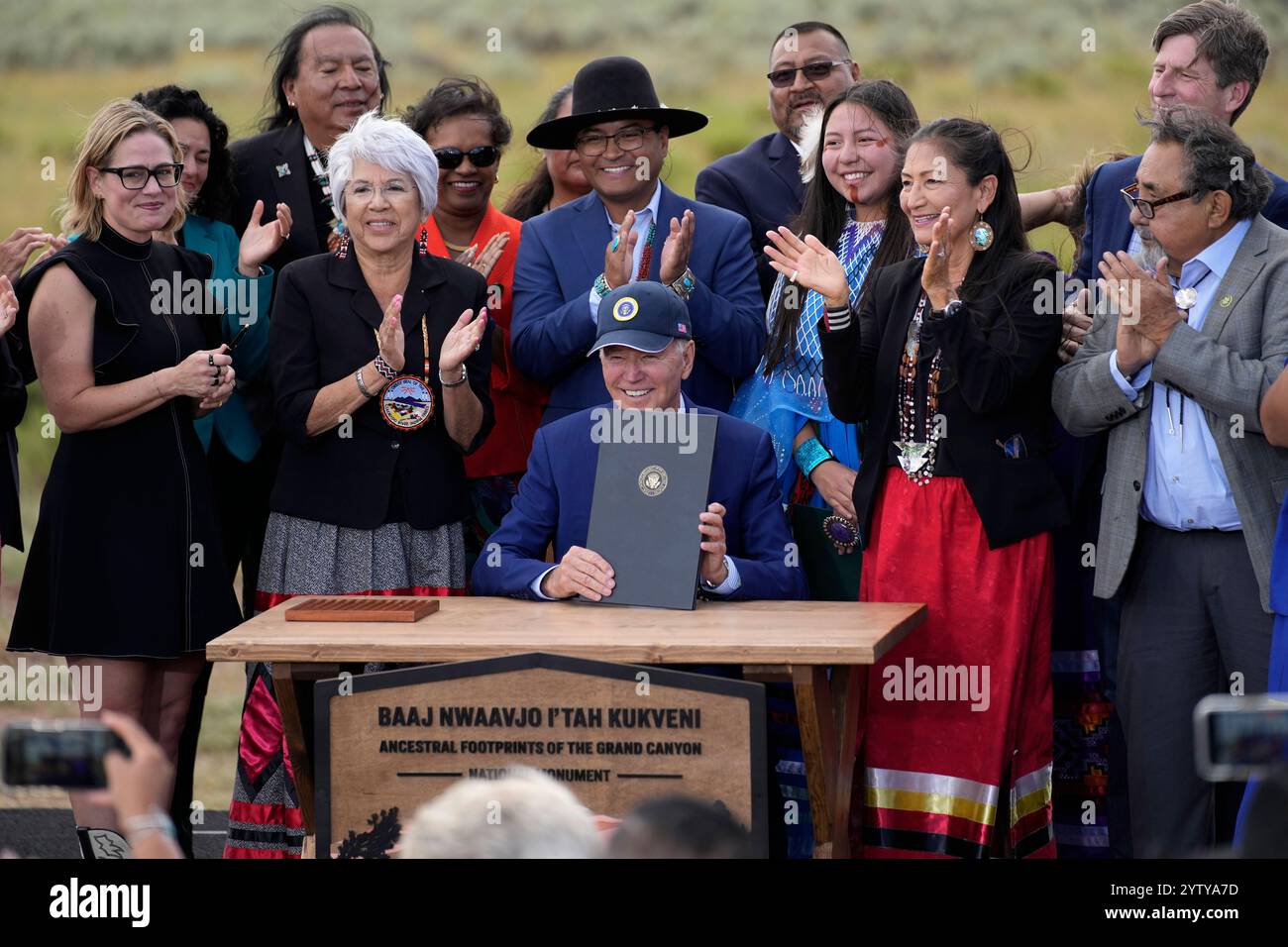 FILE - President Joe Biden holds up a proclamation designating the Baaj ...