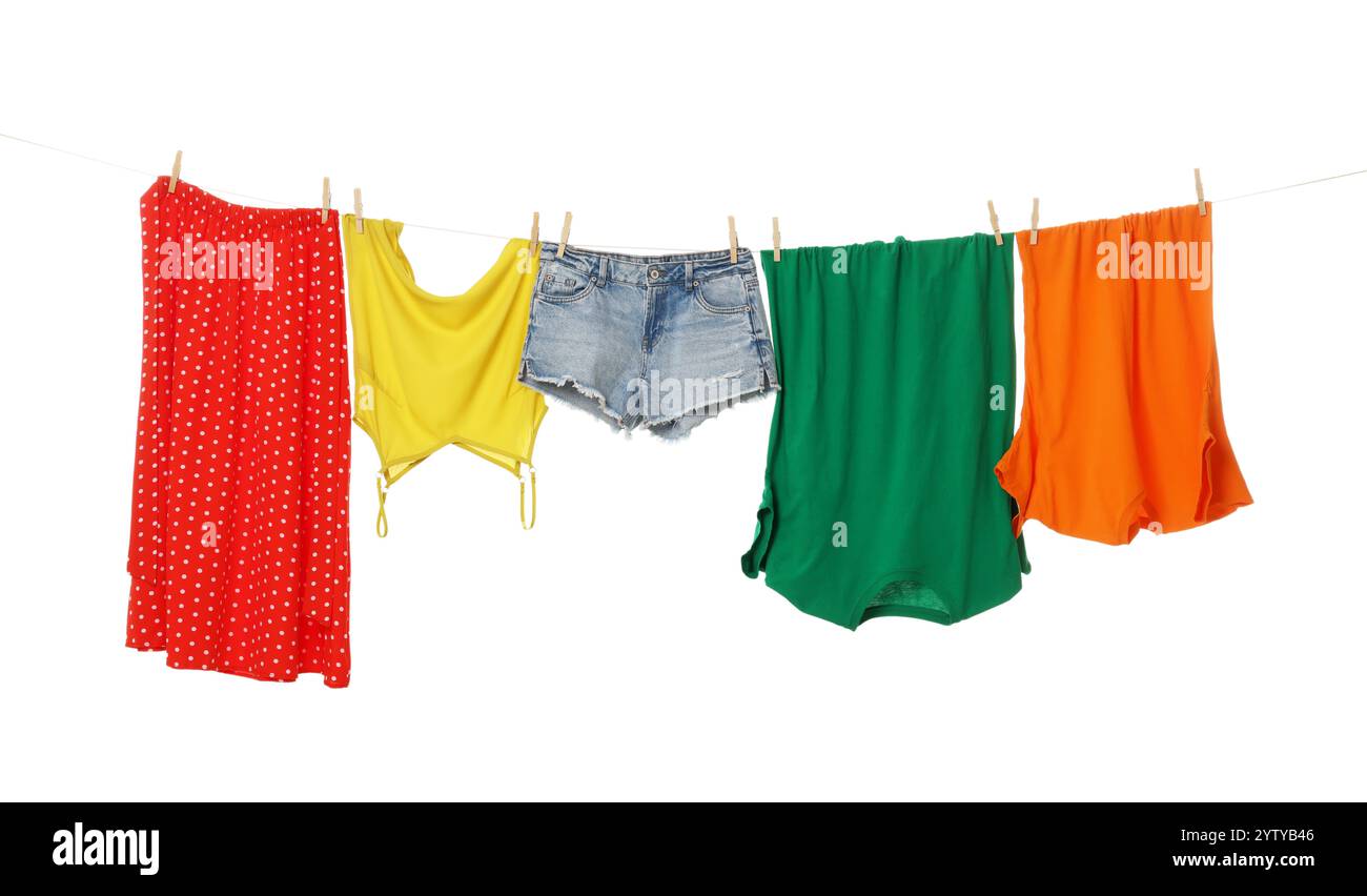 Different clothes drying on laundry line against white background Stock ...