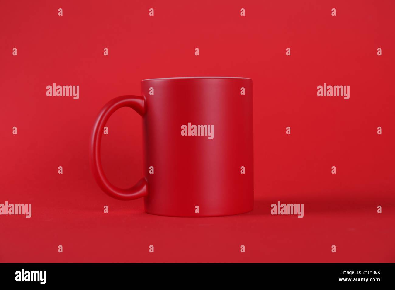 One blank mug on red background. Mockup for design Stock Photo - Alamy