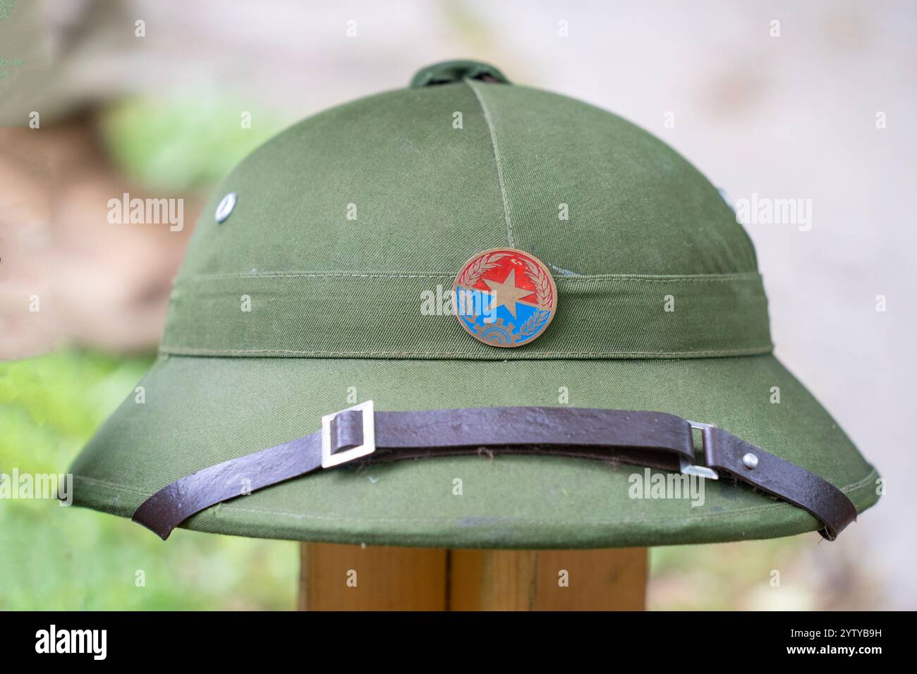 Green Vietnamese military hat with communist crest from the Vietnam War ...