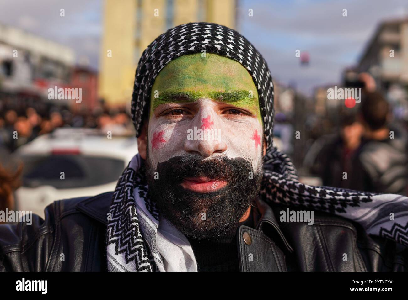 Ankara, Turkey. 08th Dec, 2024. A Syrian appears to have painted his ...
