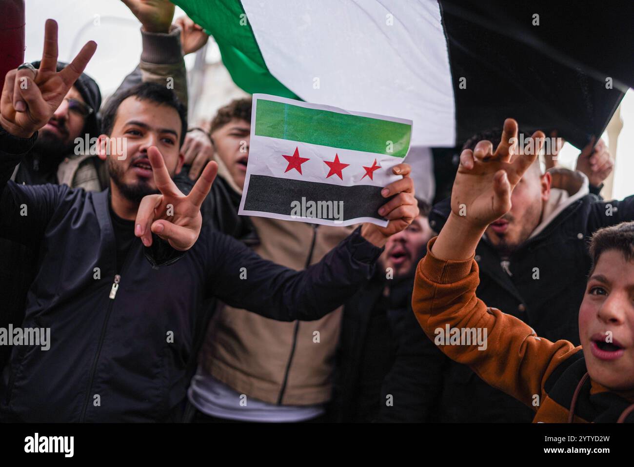 Ankara, Turkey. 08th Dec, 2024. Syrians are seen celebrating on the ...