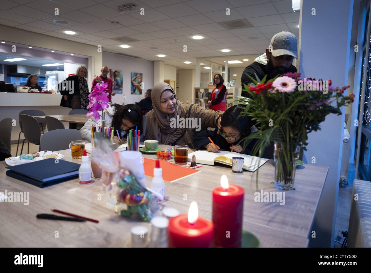 Two women sign book hi-res stock photography and images - Alamy