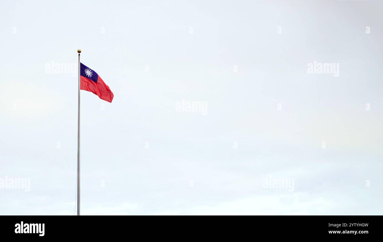 Taiwan flag flying with empty copy space for text, evoking a sense of ...