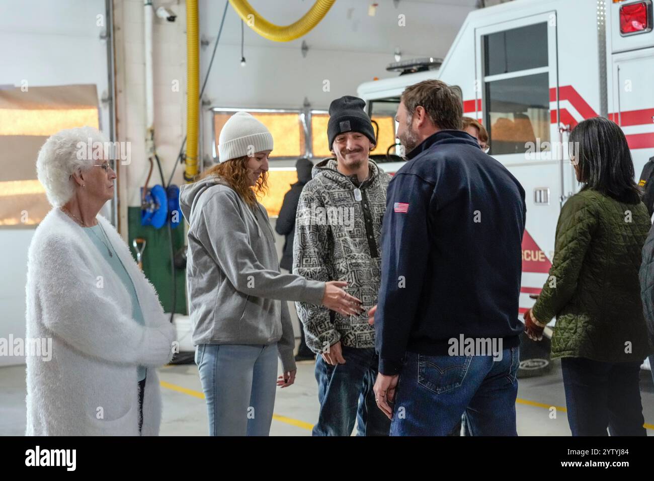 At the Fairview Volunteer Fire Department with his wife, Usha, far ...